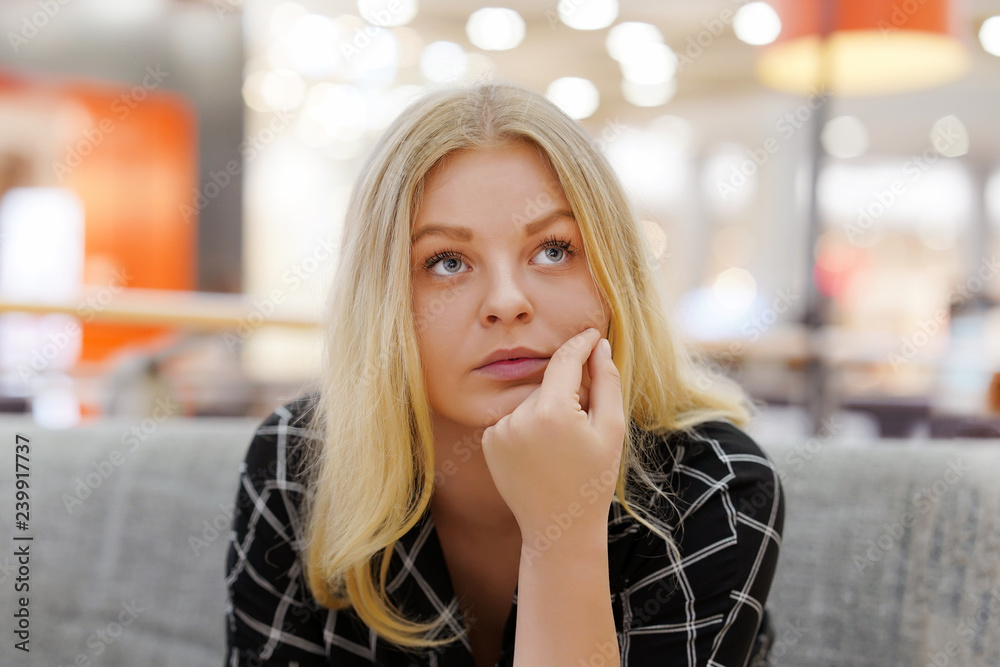 Lonely young girl is sad. Portrait of a beautiful sad girl close-up ...