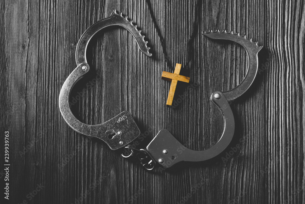 Simple Wood Cross and Unchain Handcuffs. Concept of Jesus Christ the ...
