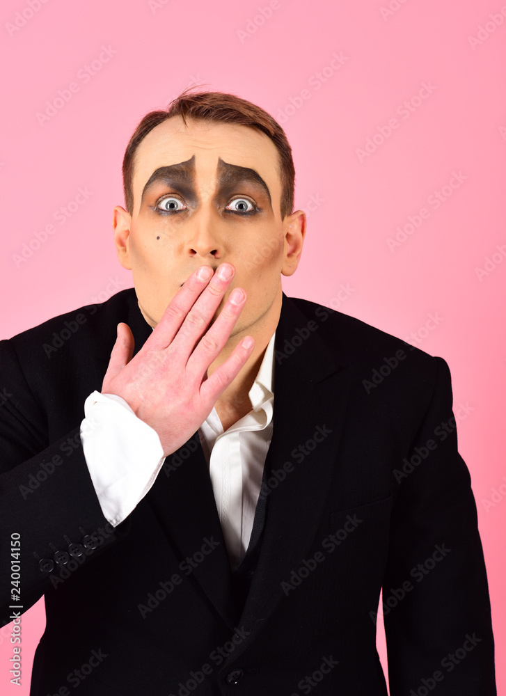 Keeping secret. Mime artist cover mouth with hand. Mime with face paint ...