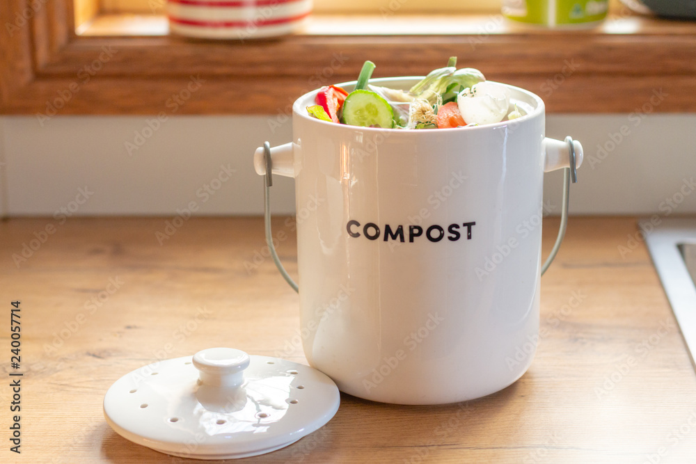 recycle kitchen food waste compost container full of kitchen waste on ...