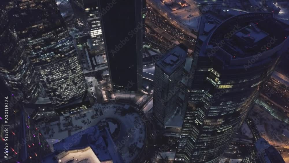 Winter Night futuristic Metropolis Skyscrapers Aerial view city traffic ...