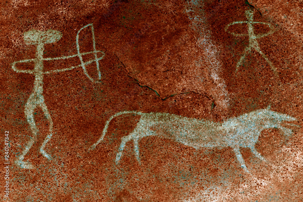 image of ancient hunters on the cave wall. history of antiquities ...