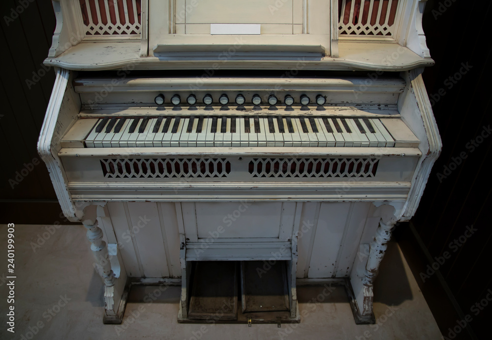 Partial topside front on view of painted antique pump organ Stock Photo ...
