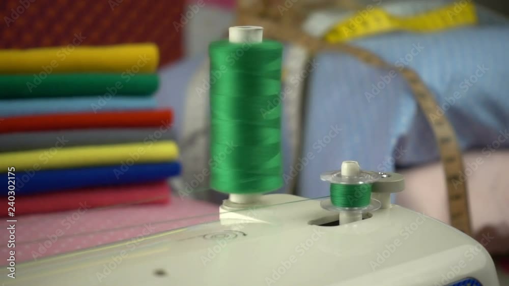 Thread is unwound from the reel during sewing to other coil in slow ...