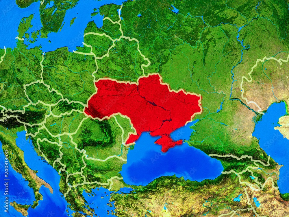 Ukraine from space on model of planet Earth with country borders and ...
