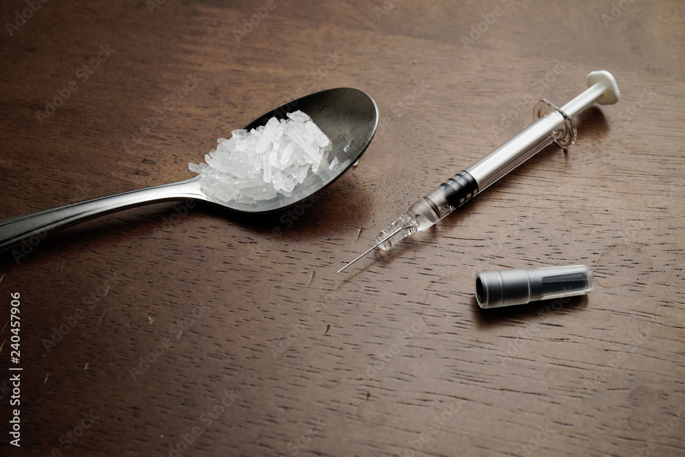 Hard crystal drugs and prohibited substances, syringes, cooked heroine ...