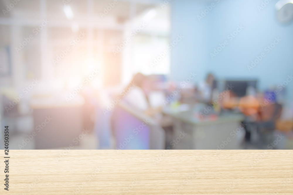 Businessmen blur in the workplace or work space of laptop on table in ...