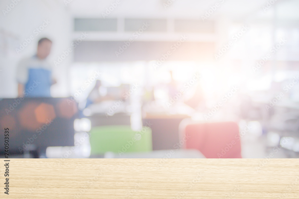 Businessmen blur in the workplace or work space of laptop on table in ...