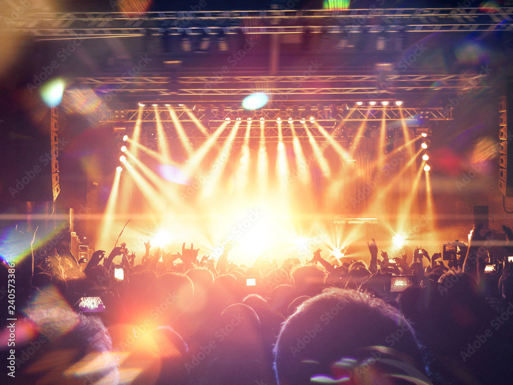 Big concert arena with clapping people Stock Photo | Adobe Stock