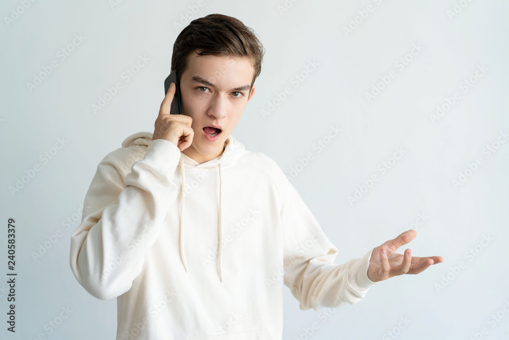 Teen Boy Talking On Phone