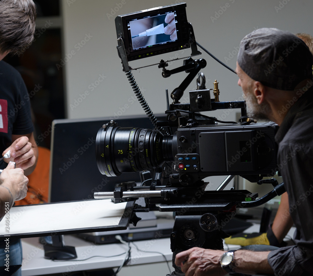 Behind the scenes of the camera when shooting a film, advertisement ...