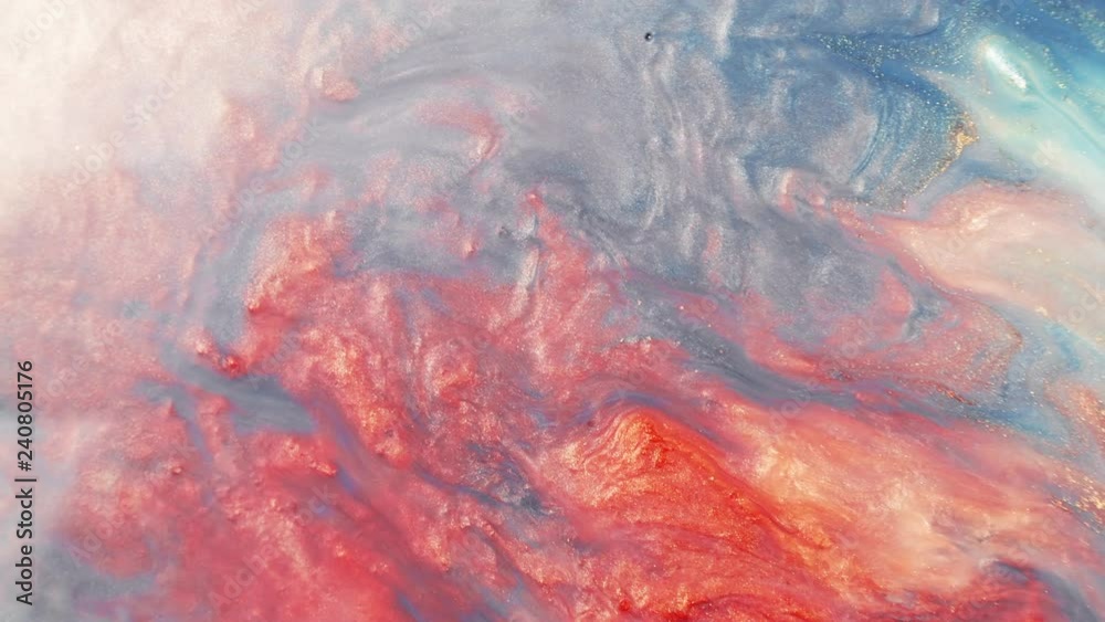 Colorful sparkling paints mix in beautiful patterns. Oil ink of red ...