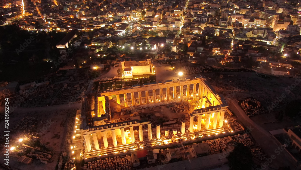 Aerial drone detail night shot of iconic Acropolis hill and the Parthenon a masterpiece of ...