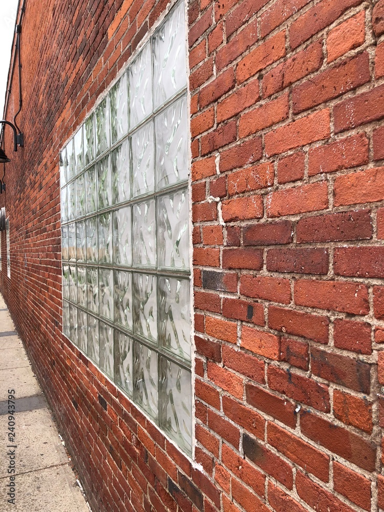 brick wall with glass bricks Stock Photo | Adobe Stock
