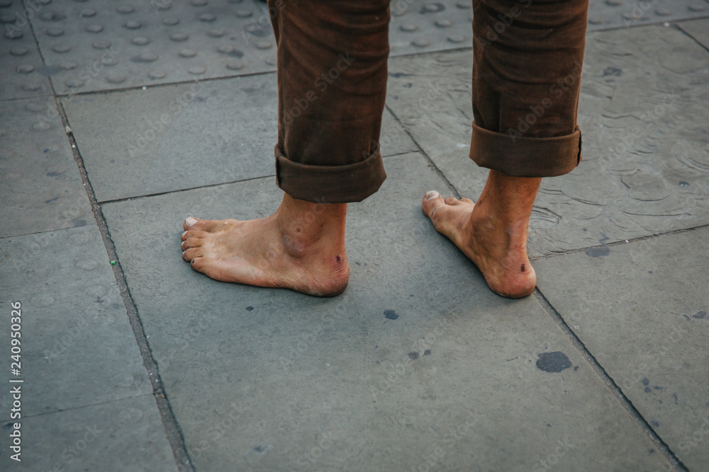 man barefoot in the streets of London Stock Photo | Adobe Stock