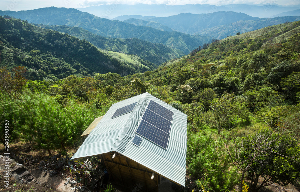 Traditional wooden house with solar panels in the mountains Stock Photo ...