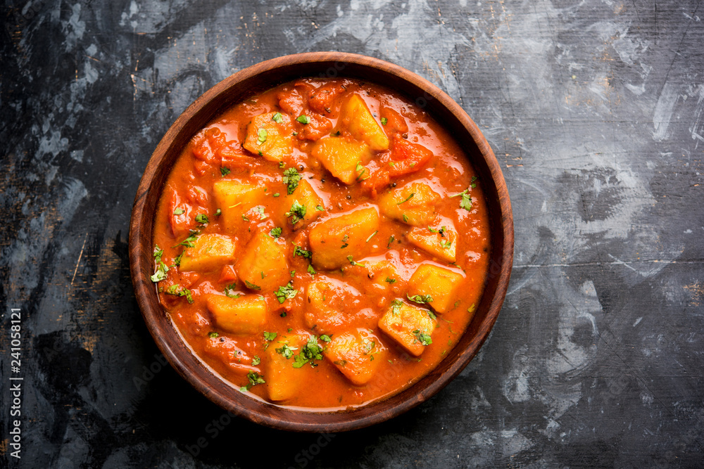 Indian food - Aloo curry masala. Potato cooked with spices and herbs in ...