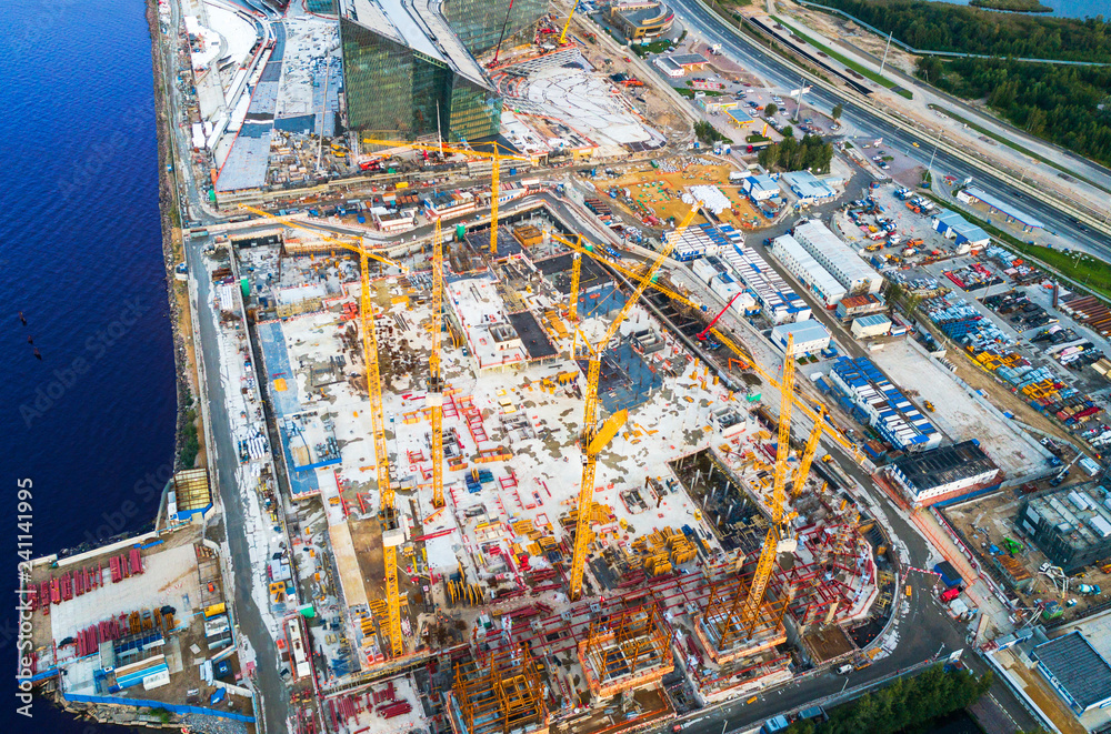 Aerial view of a Construction crane tower. Top view Crane and building ...