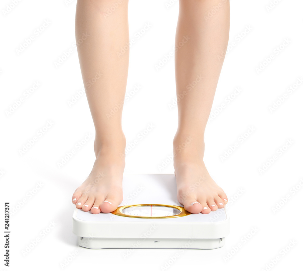 Female feet weighing scale on a white background isolation Stock Photo ...