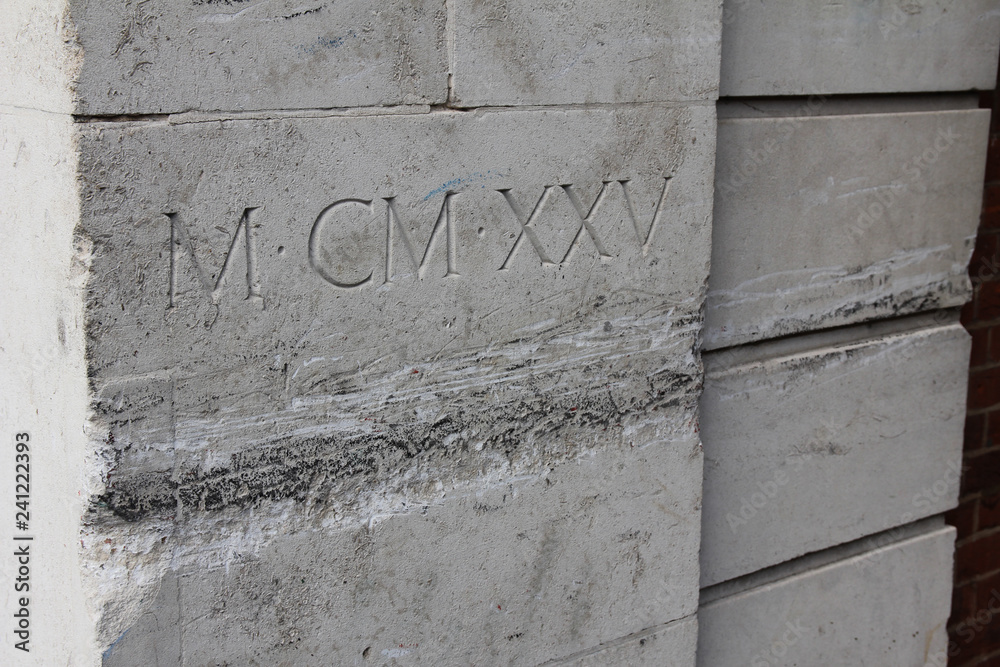 Roman Numerals on Brick Work Stock Photo | Adobe Stock