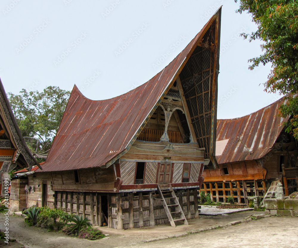 Traditional Batak house at Ambarita, Samosir island, Sumatra, Indonesia ...