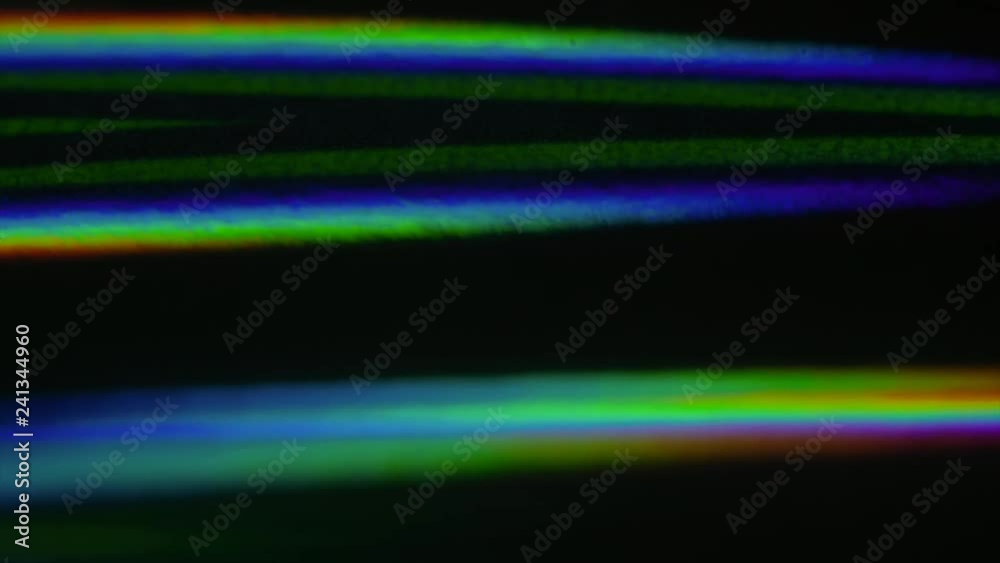 light into the seven colors of the spectrum. Light source rotates ...