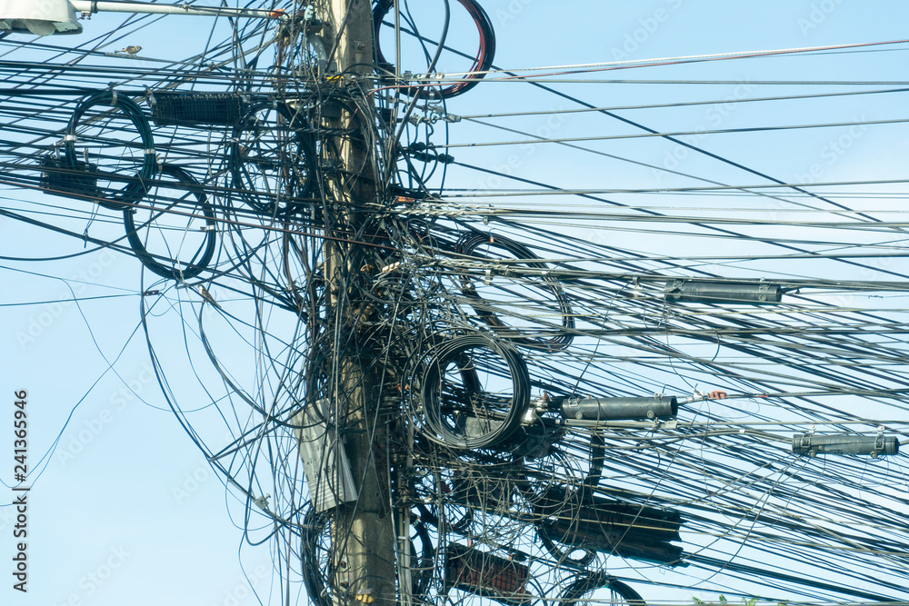Various types of wires that are messy on the power pole. Stock Photo ...