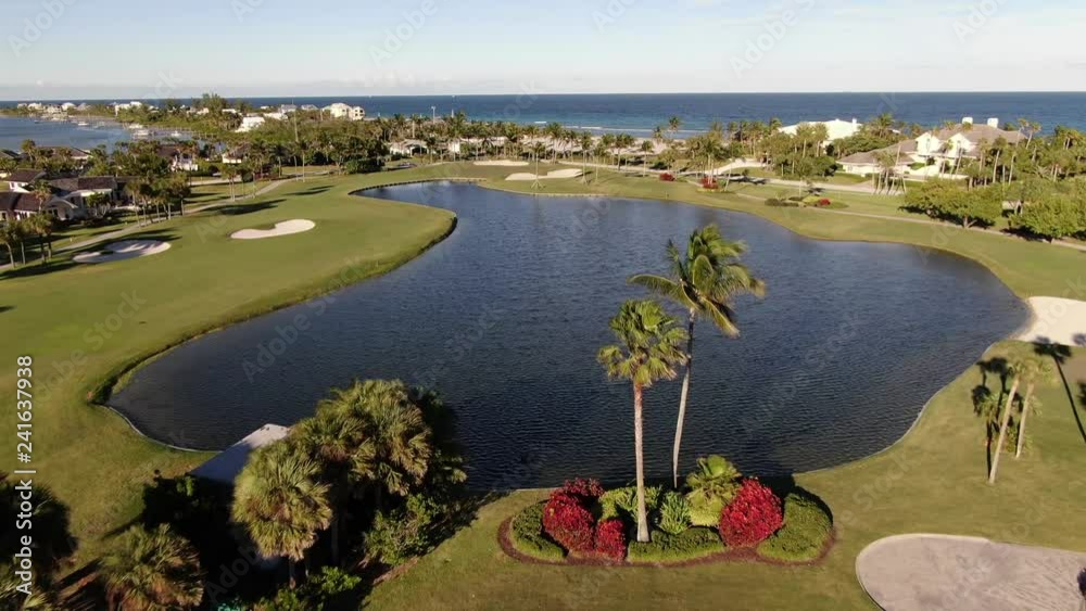 Aerial of luxury homes lining Port St. Lucie's waterfront, with views ...