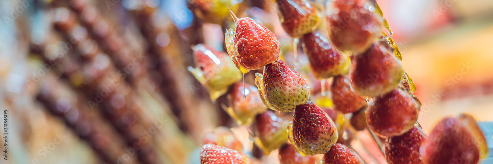 Chinese candied fruits and berries, Hawthorn and strawberries in sesame ...