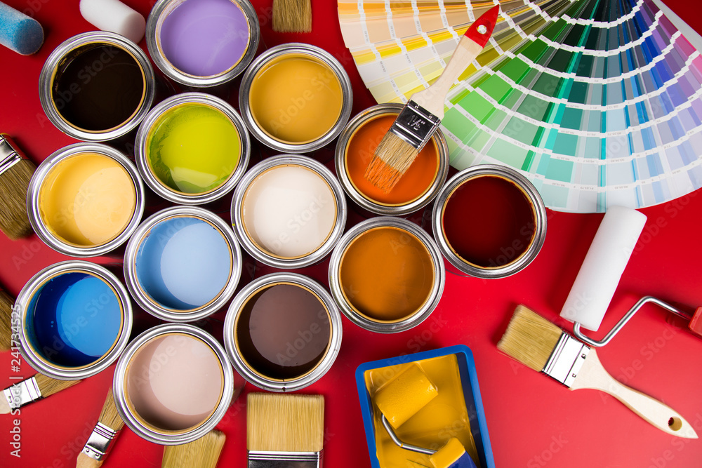 Collection of colored paints cans, Brush, red background Stock Photo ...