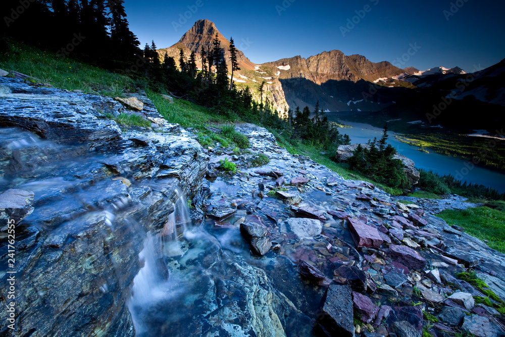 GLACIER NATIONAL PARK, MONTANA: Hidden Lake and waterfall along the ...
