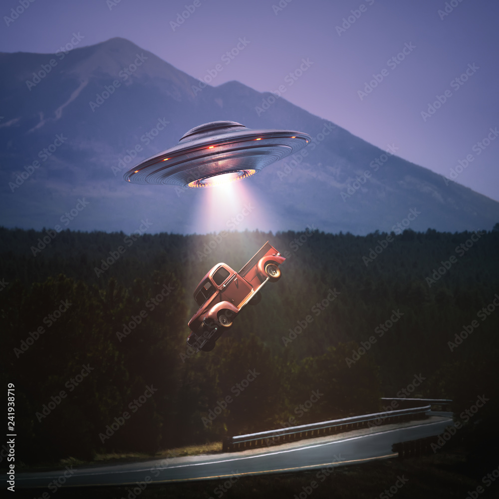 Unidentified flying object lifting a car from road. Concept of alien ...
