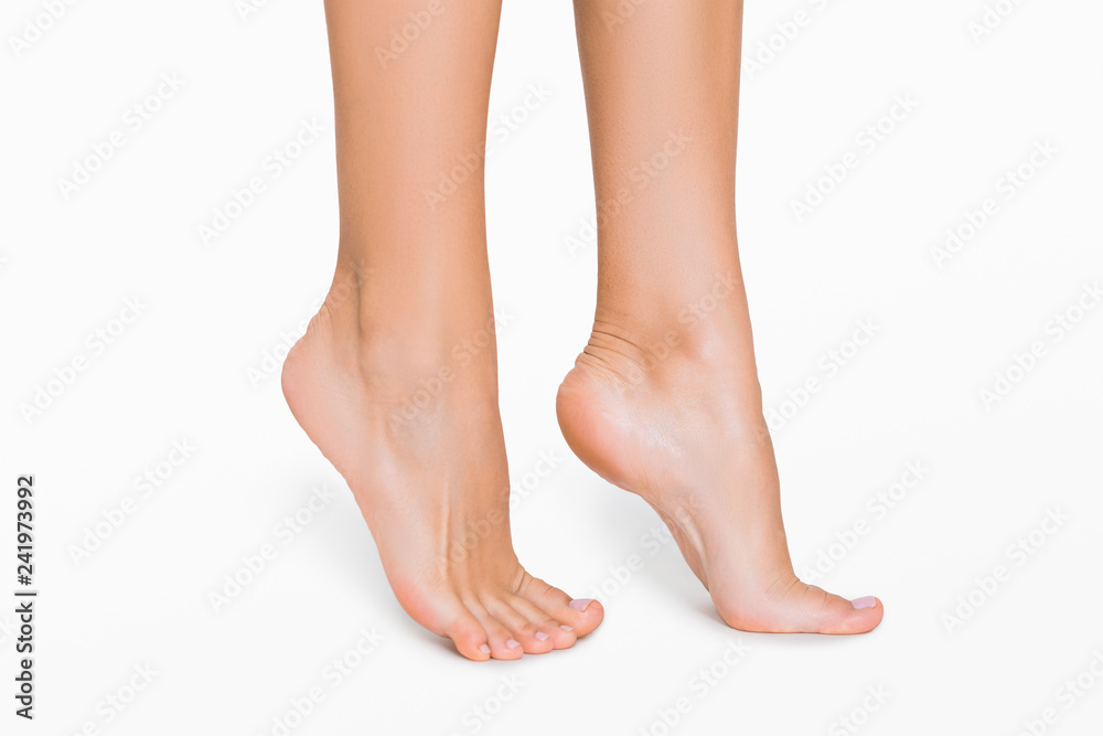 Perfect female feet with smooth skin isolated on white Stock Photo ...