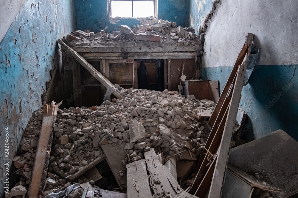 Inside empty destroyed building, collapsed walls and roof Stock Photo ...