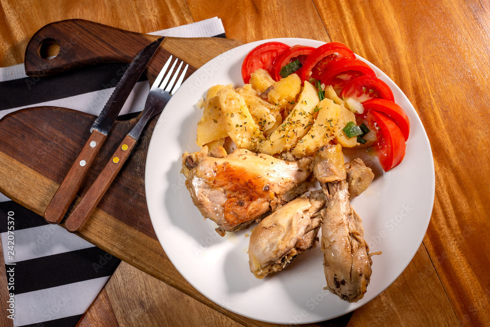 Pollo con papas Stock Photo | Adobe Stock
