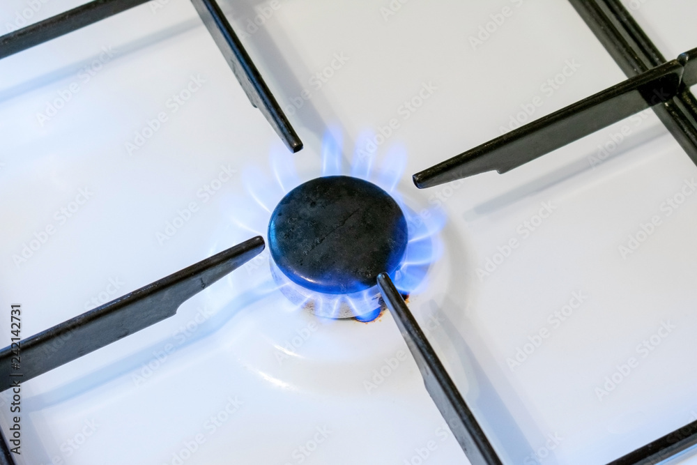 Gas burner flame close up. Can be a source of fire or explosion ...
