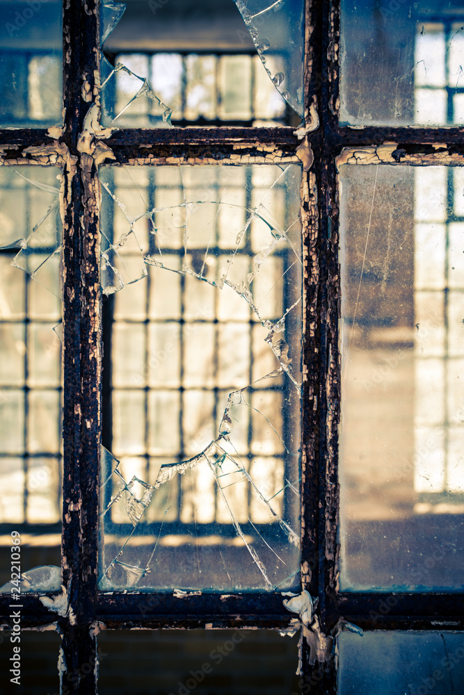 Broken glass windows from abandoned hospital building Stock Photo ...