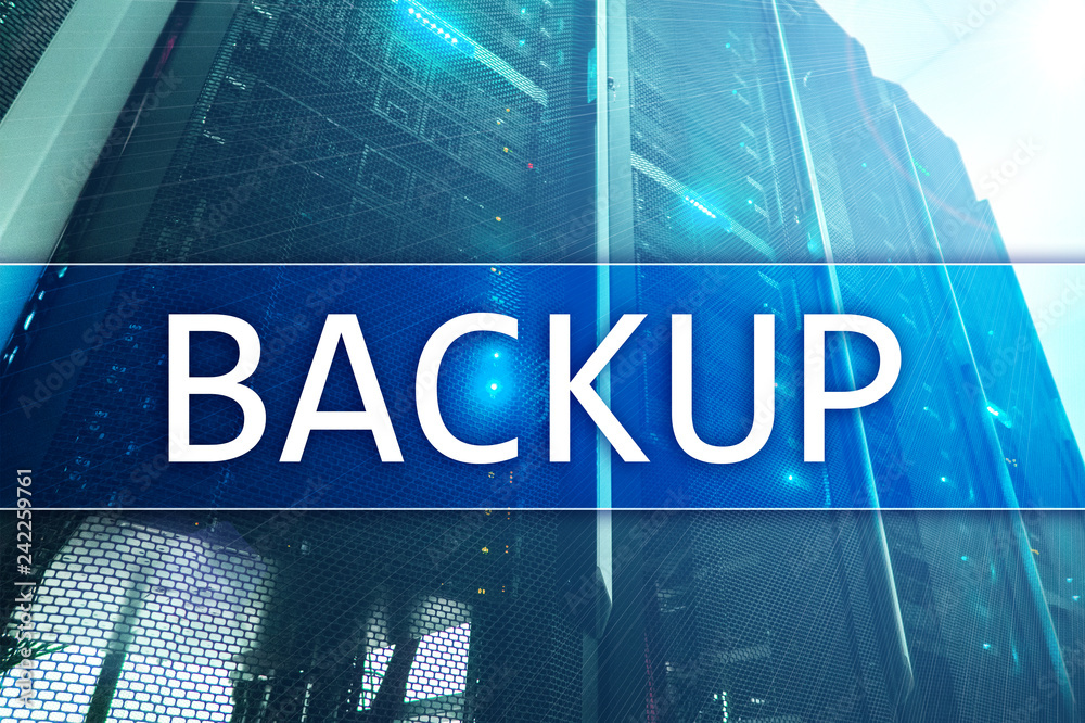 Backup button on modern server room background. Data loss prevention ...