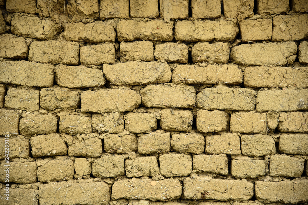 Texture of wall made of clay bricks Stock Photo | Adobe Stock
