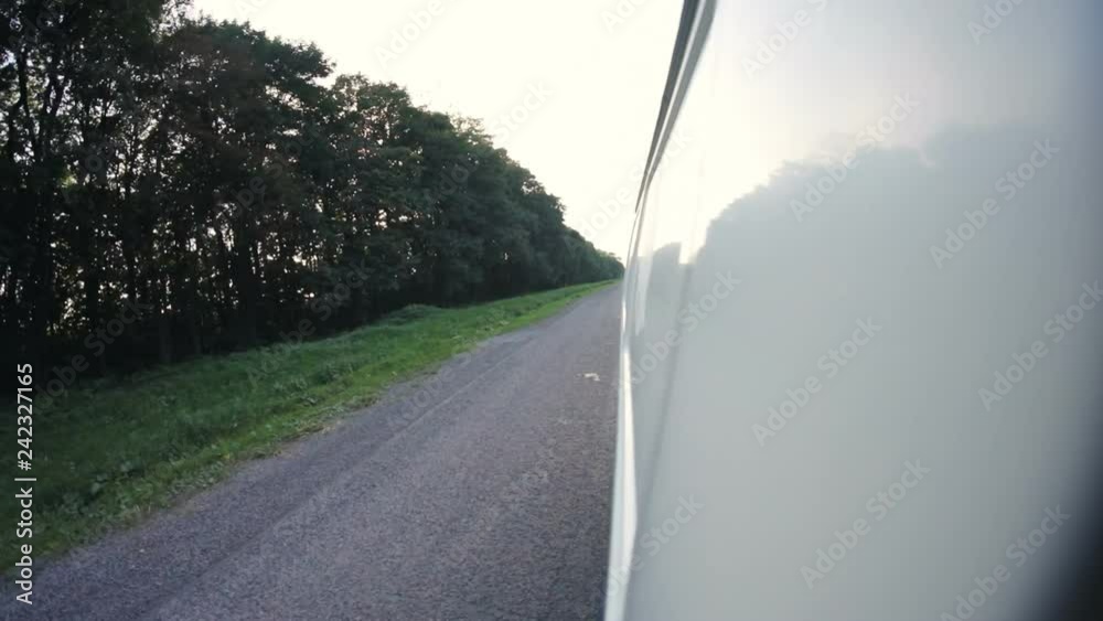 View of the car side with a 4k mounted camera opening views of the ...