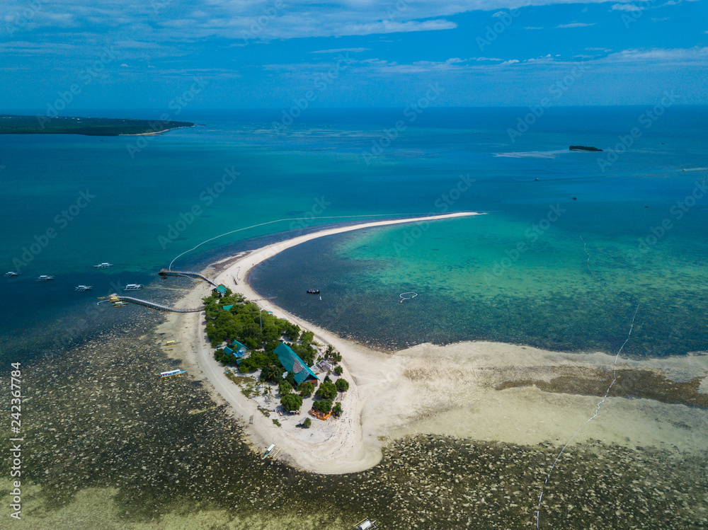 Aerial view of curved beach of Pontod virgin island located near ...