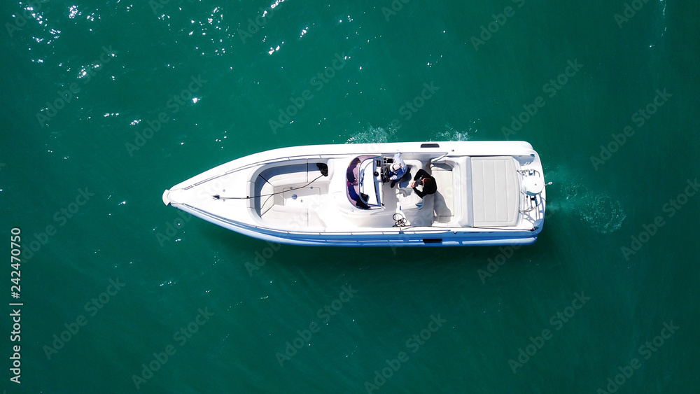 Aerial bird's eye top view photo taken by drone of boat docked in ...