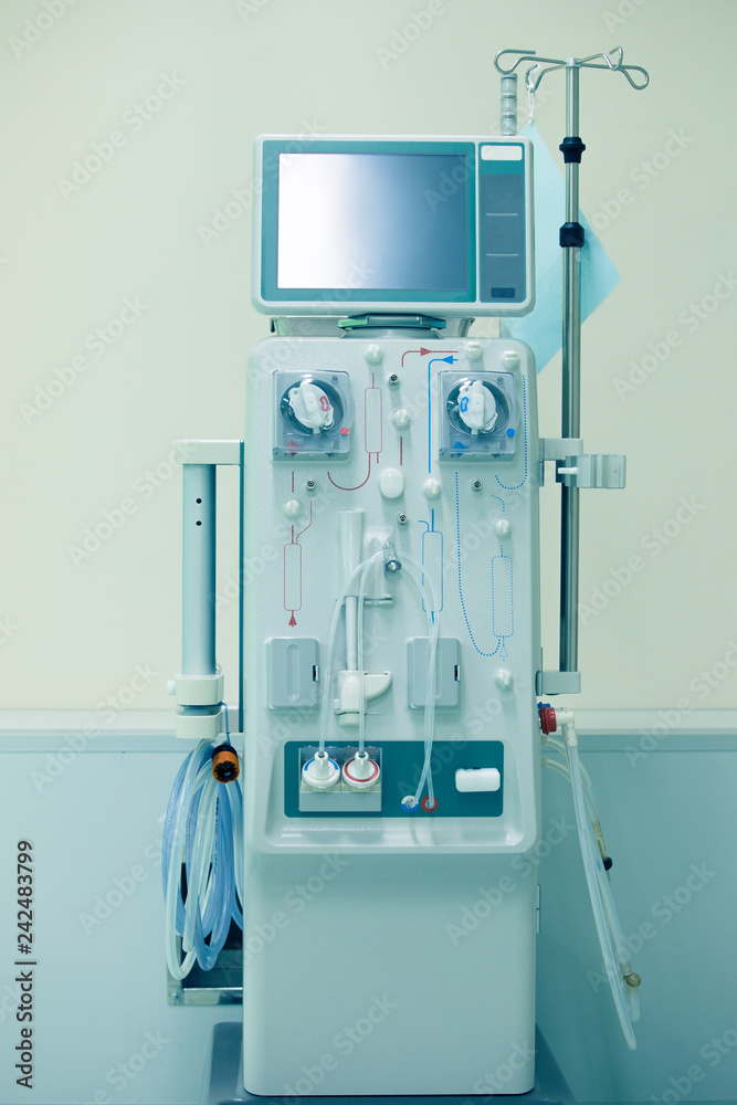 Dialysis machines in empty hospital room,Hemodialysis machine in an ...