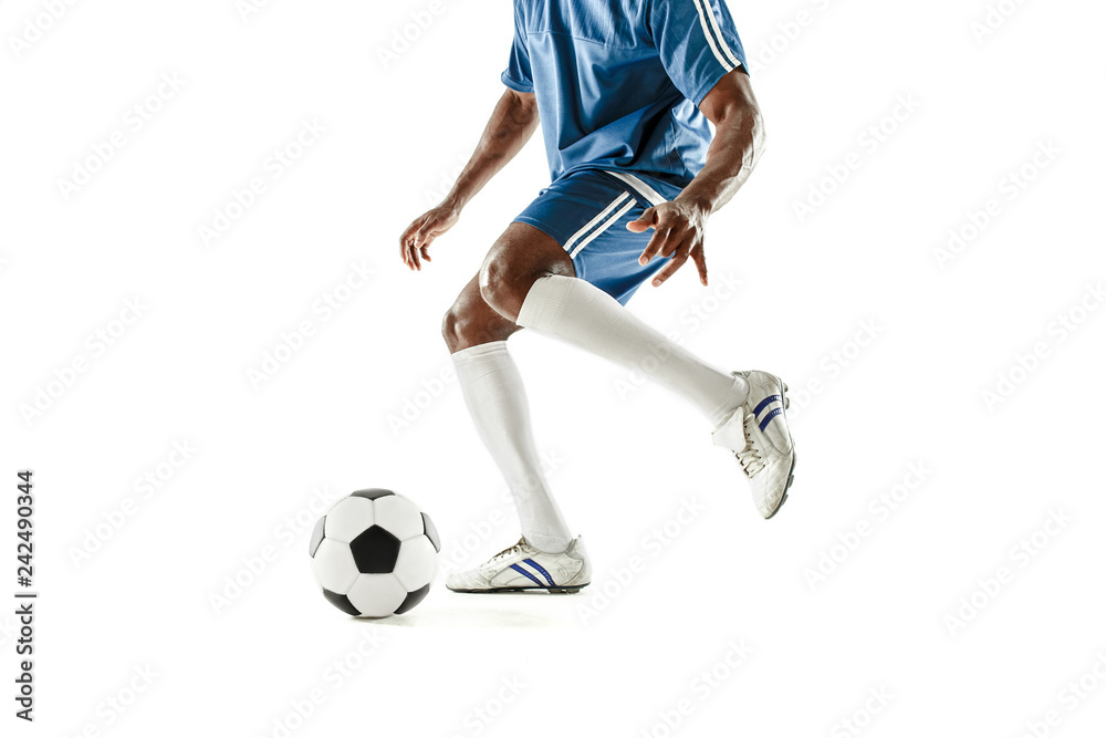 The legs of soccer player close-up isolated on white. African american ...
