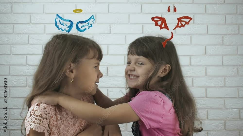 The kids are fighting. Sisters feuding. Angel and demon. Little girls ...