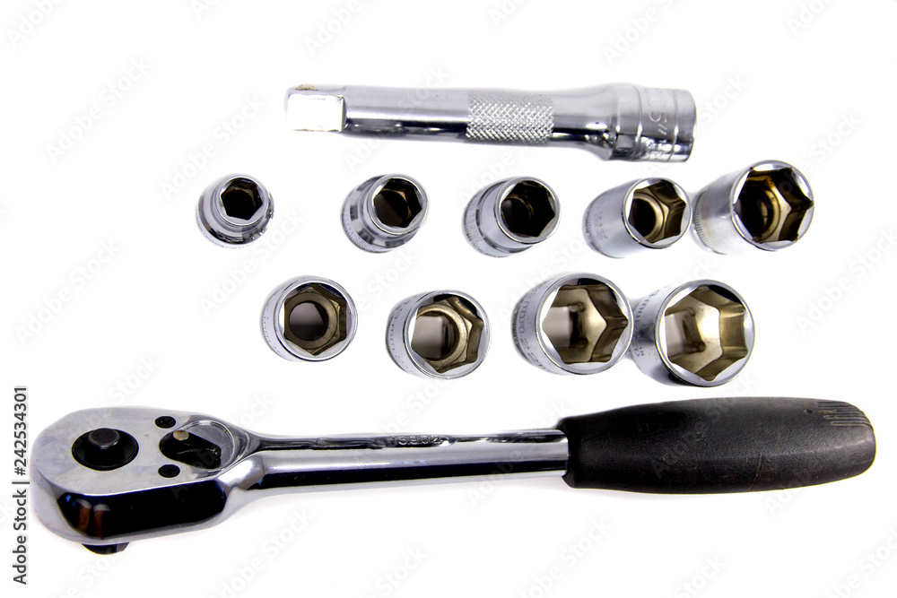 Set of socket metal wrench with black handle over white isolated ...
