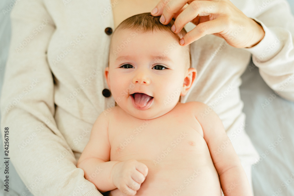 Baby laughing at his mother's belly in the morning when he woke up ...