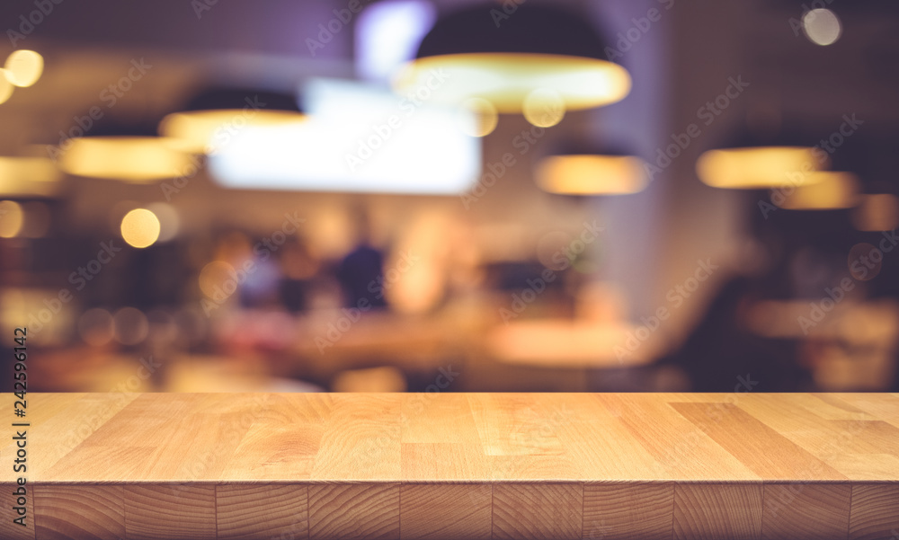 Wood texture table top (counter bar) with blur light gold bokeh in cafe ...