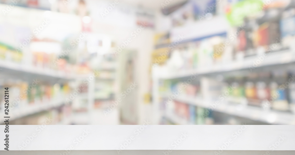 Pharmacy drugstore counter with medicine and vitamin supplement on ...