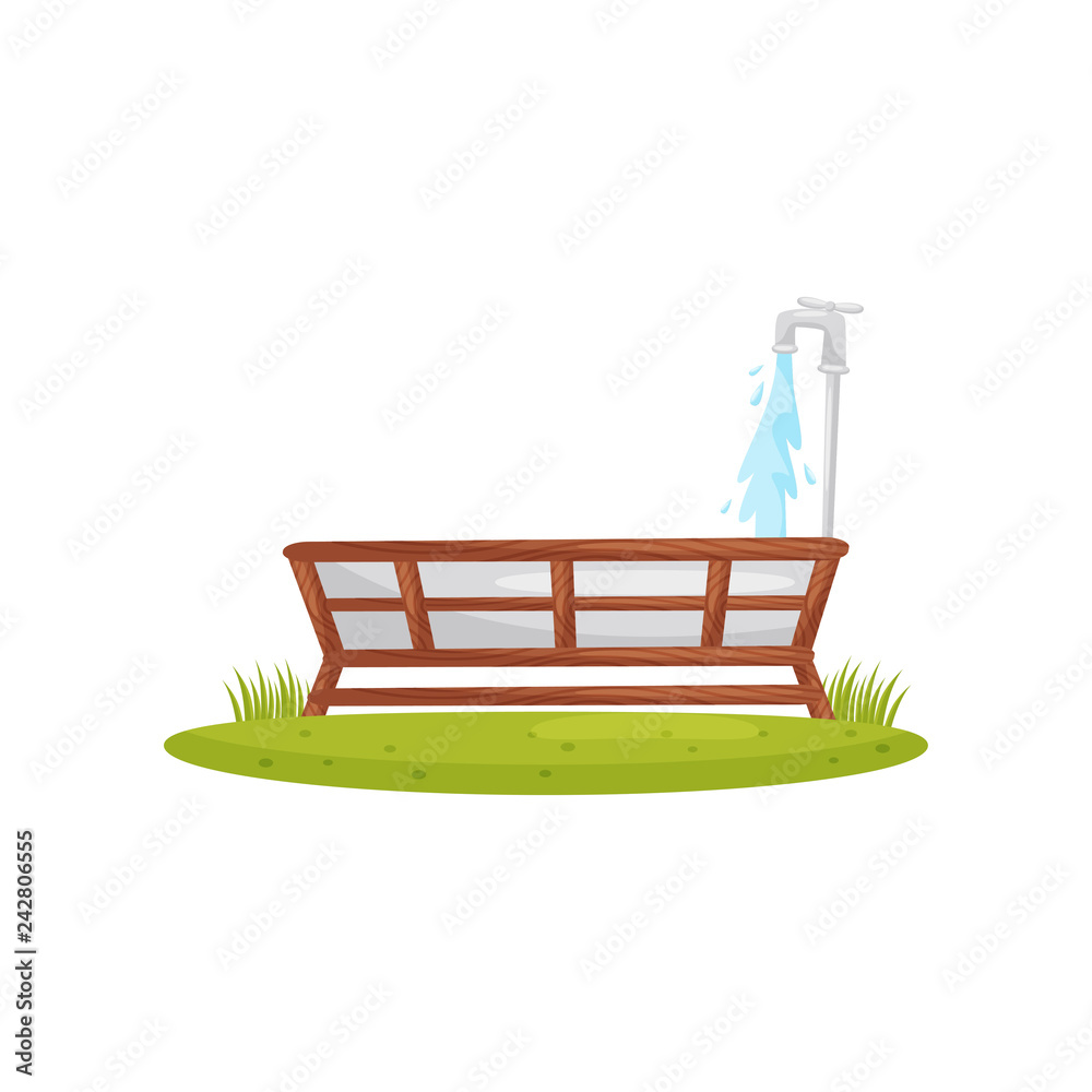 Metal water trough with faucet in wooden stand. Container for water ...